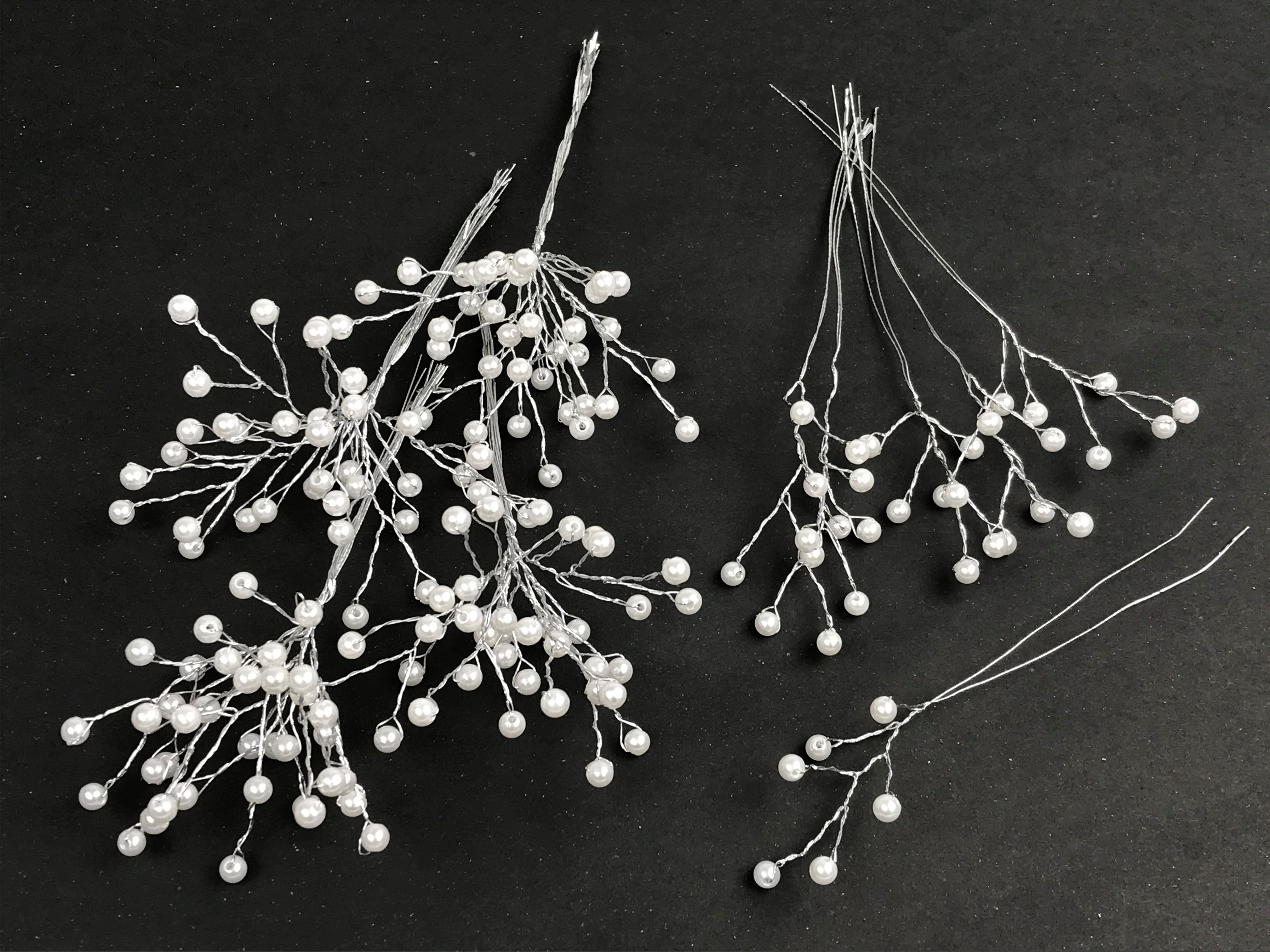 Oasis 6mm sized pearl attached to fine steel wire, and assembled into ...